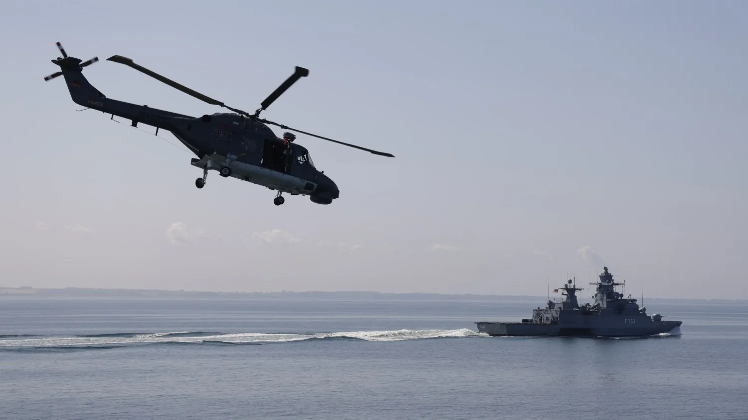 Tensions Rise: Russian Warship Opens Fire on German Helicopter